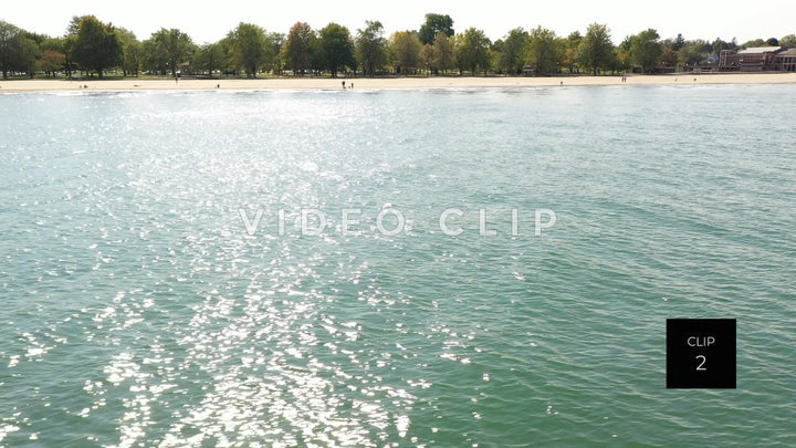 CLIP 8 - Aerial view over Lake Ontario of Ontario Beach Park and ...